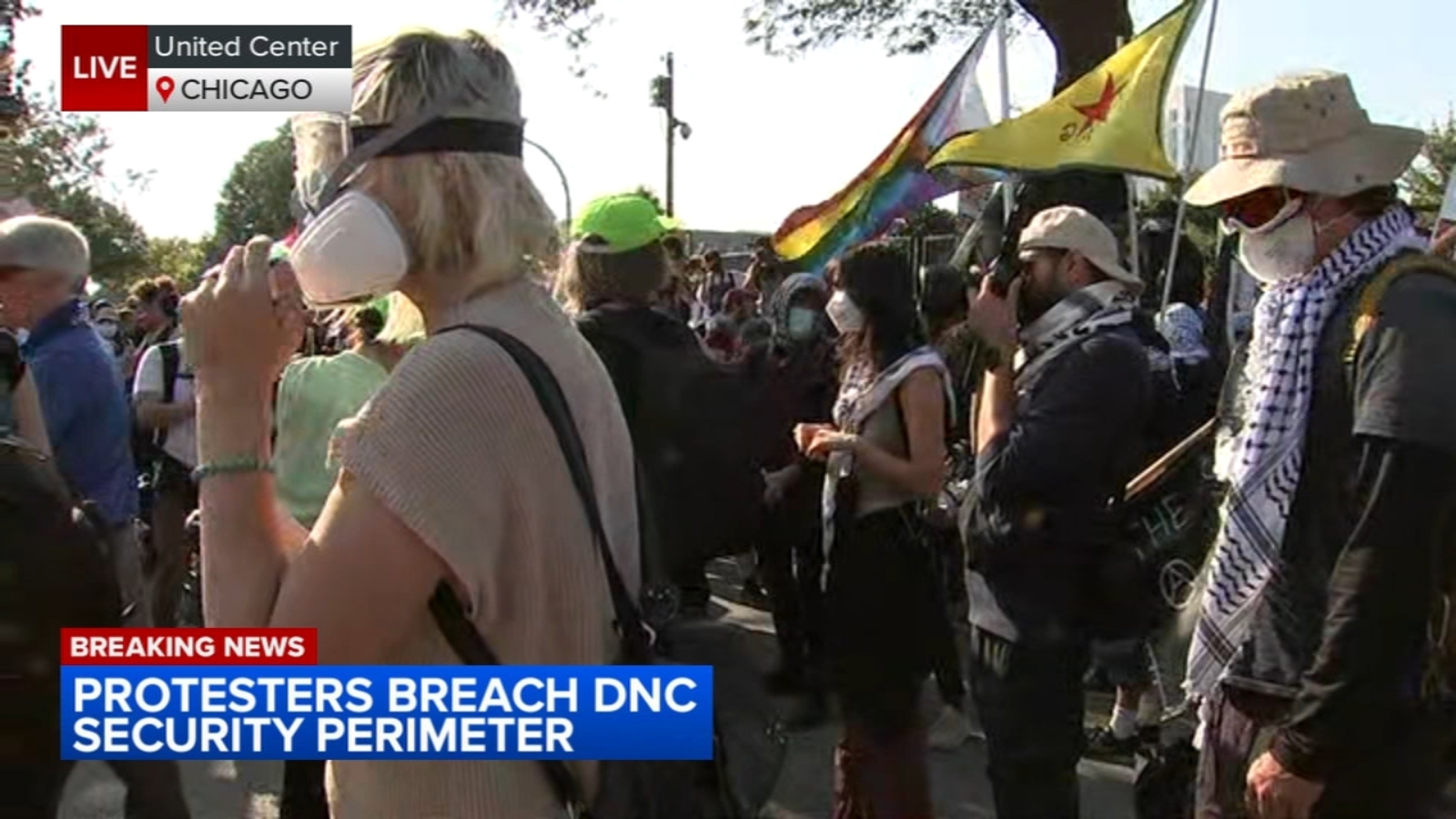 Arrests made after protesters breach security fence on north side of ...