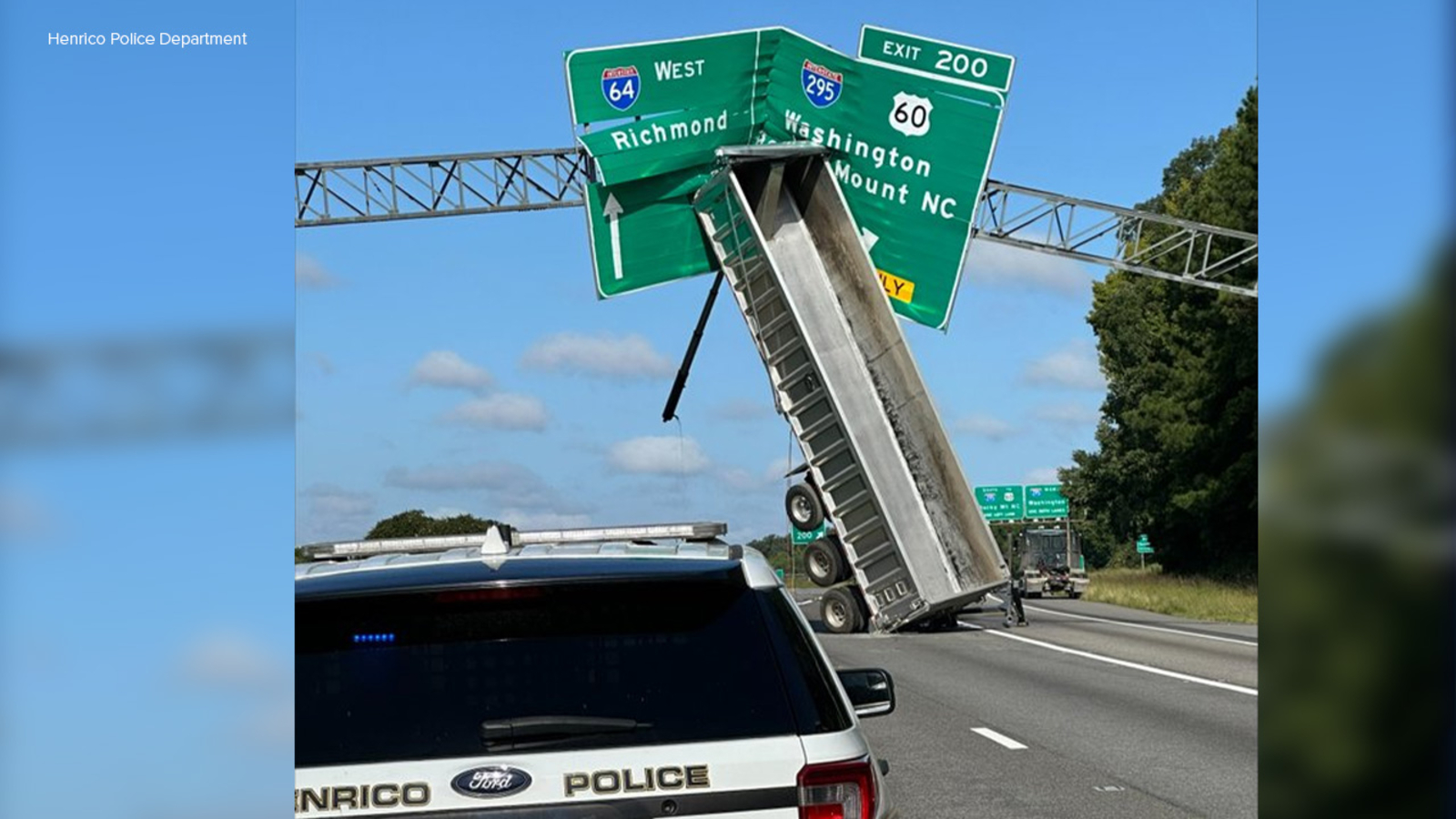Semi's trailer crashes on highway sign in bizarre crash in Virgina ...