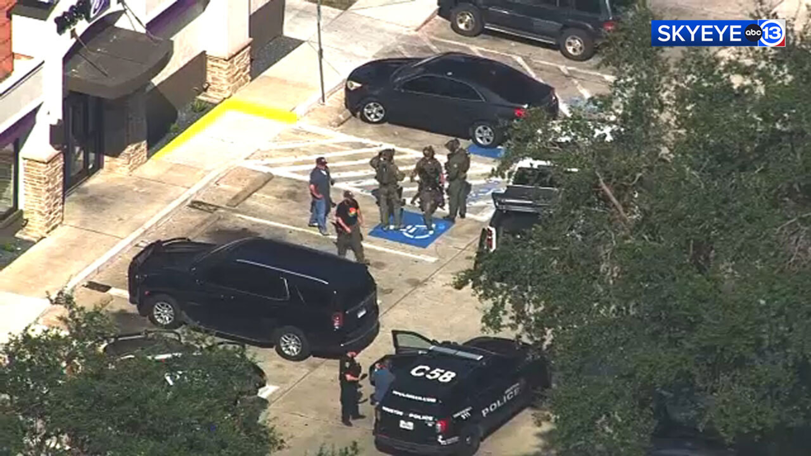 Houston police officer shot while finding zip-tied mom in Spring Branch ...