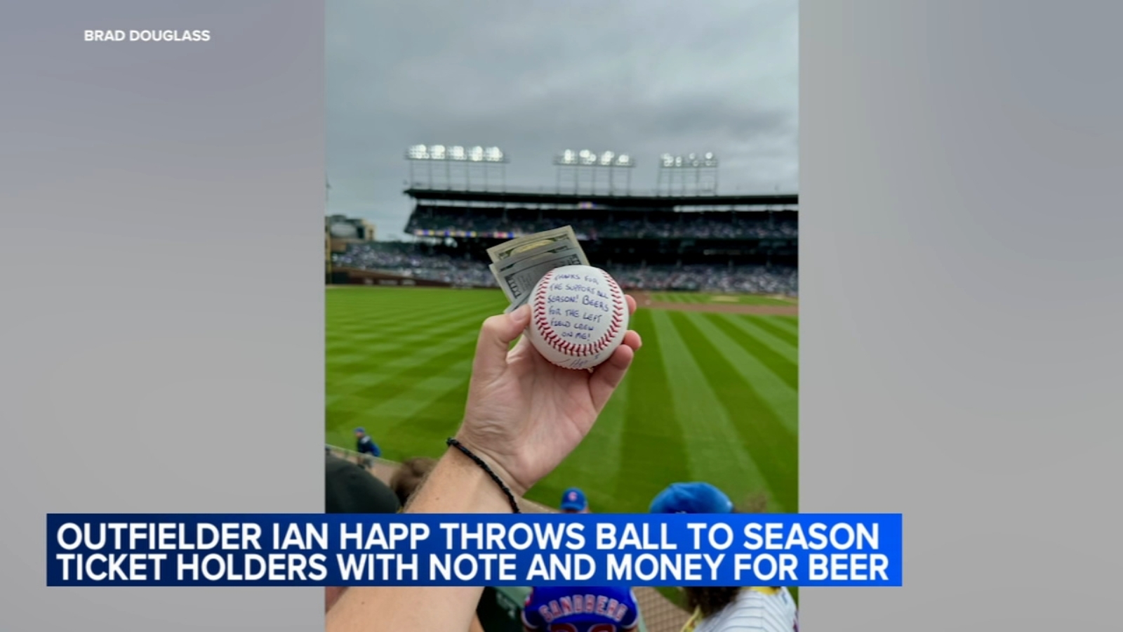 Chicago Cubs Ian Happ throws beer money to fans in left field stands ...