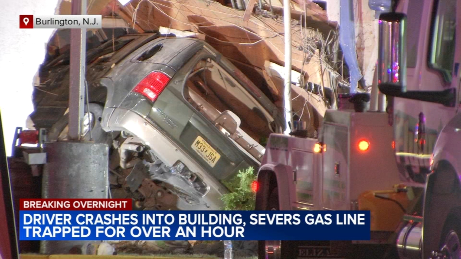 Driver trapped for over an hour after losing control, crashing into ...