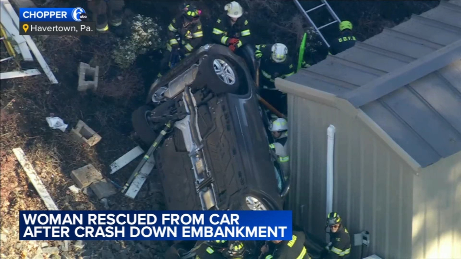 Woman rescued from car after crashing down embankment in Havertown ...