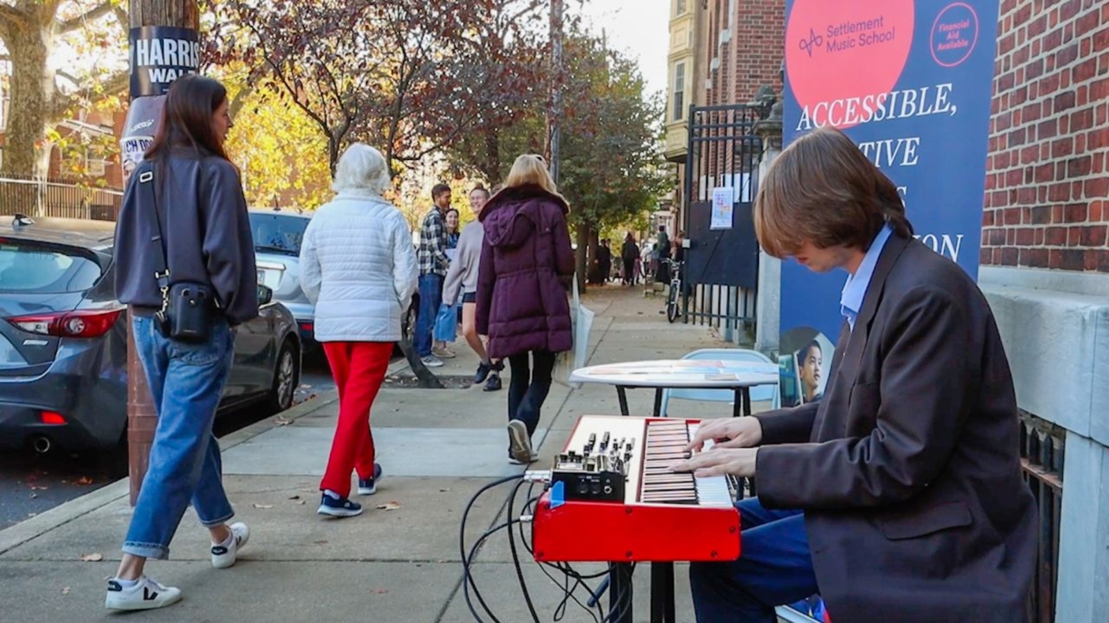 Philadelphia voters are greeted by a performance at the polls in Queen ...