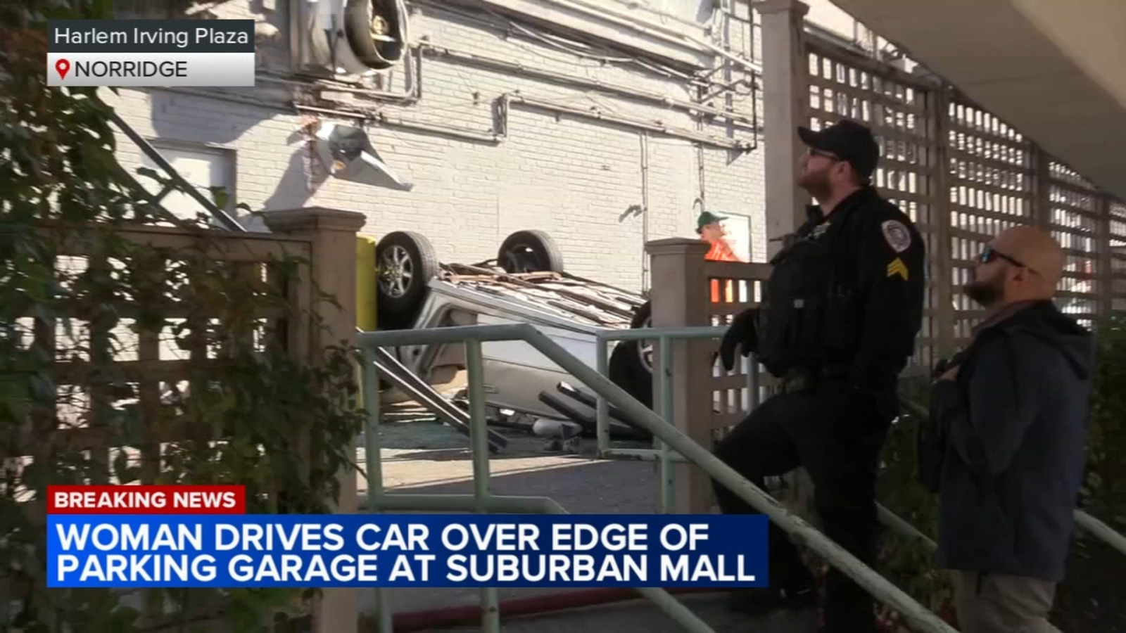 Woman drives off edge of parking garage attached to Harlem Irving Plaza ...