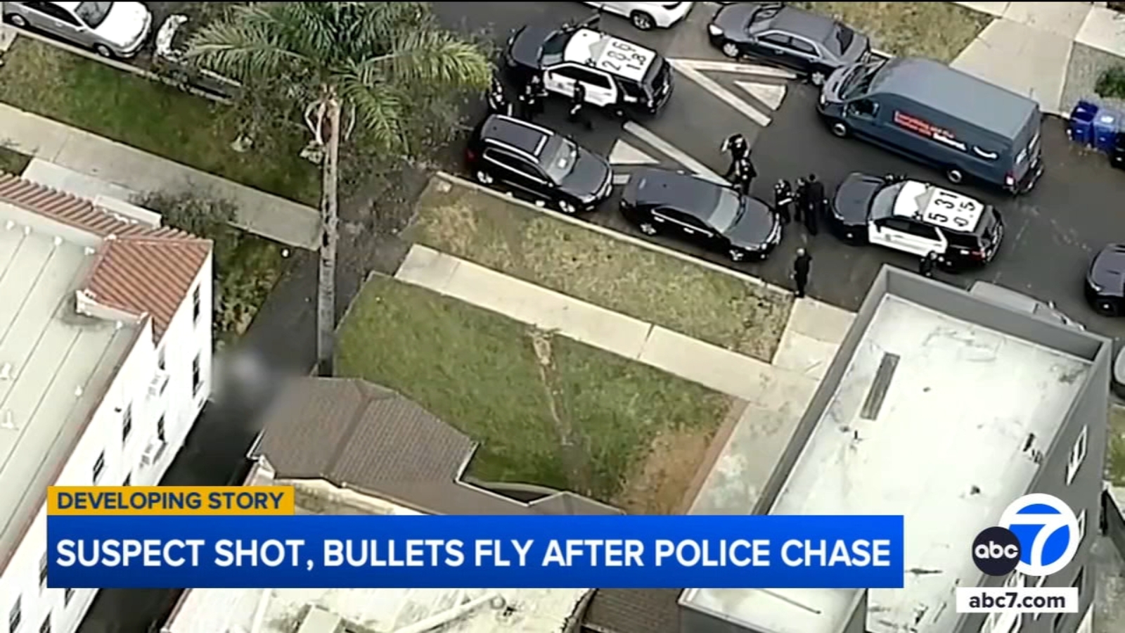 Suspect shot after firing at LAPD with gun in each hand at end of chase, police chief says ...