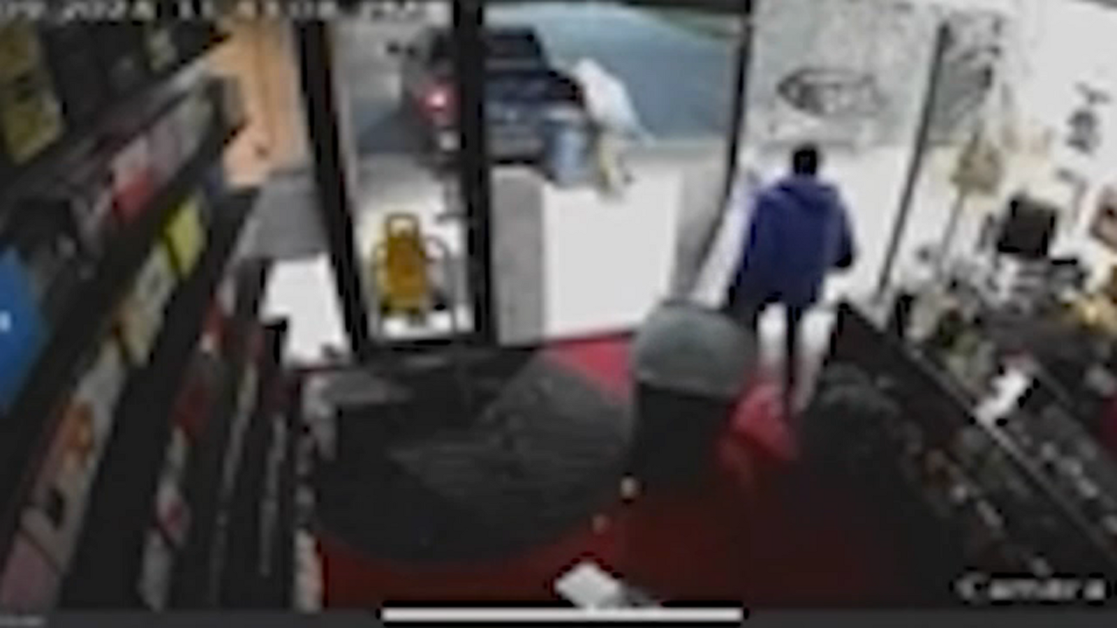 Surveillance video shows smash-and-grab crooks stealing thousands in ...