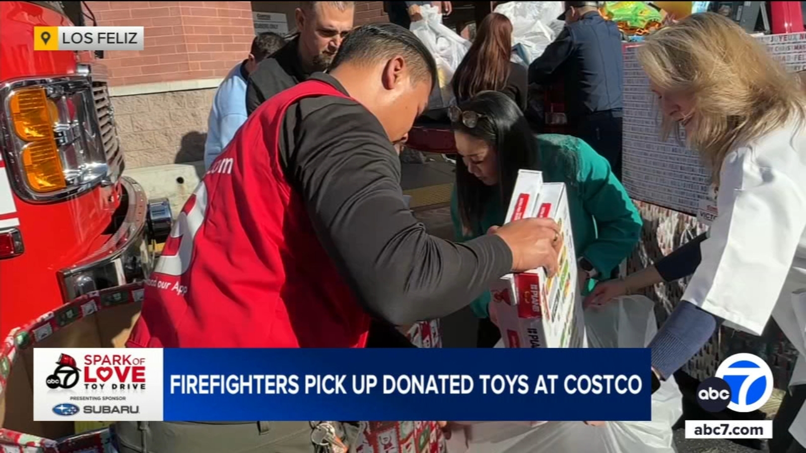 LAFD firefighters collect donated Spark of Love toys at Costco in Los ...