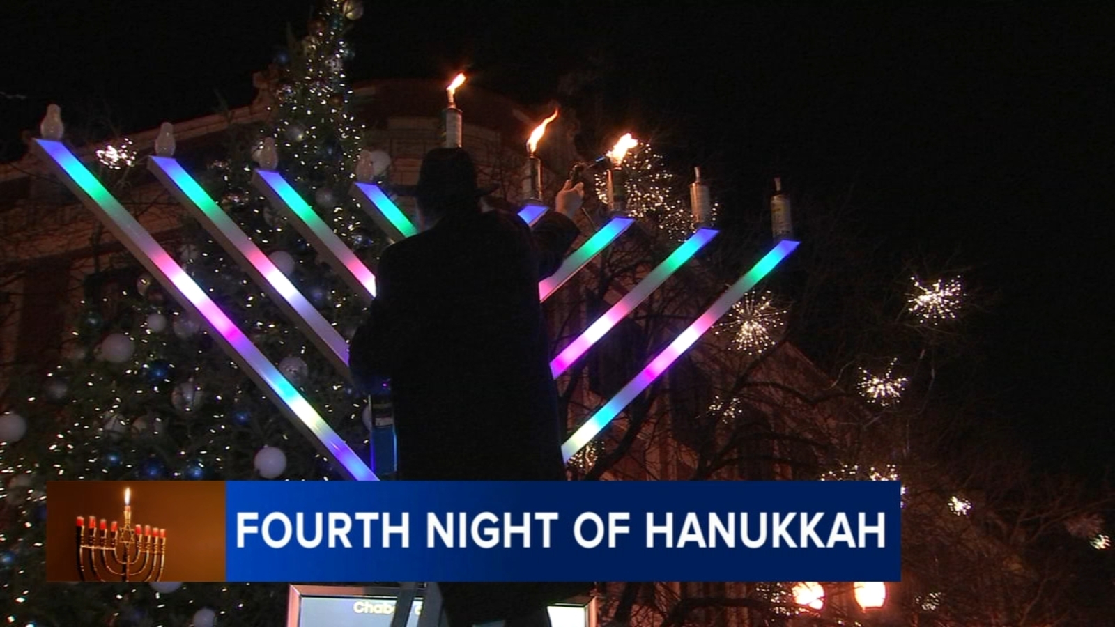 Menorah lighting held by Rabbi Baruch Hertz, Chabad of West Lakeview in ...