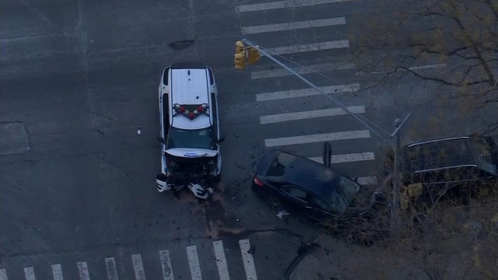 NYPD car crash: Officer in serious condition, another driver injured ...