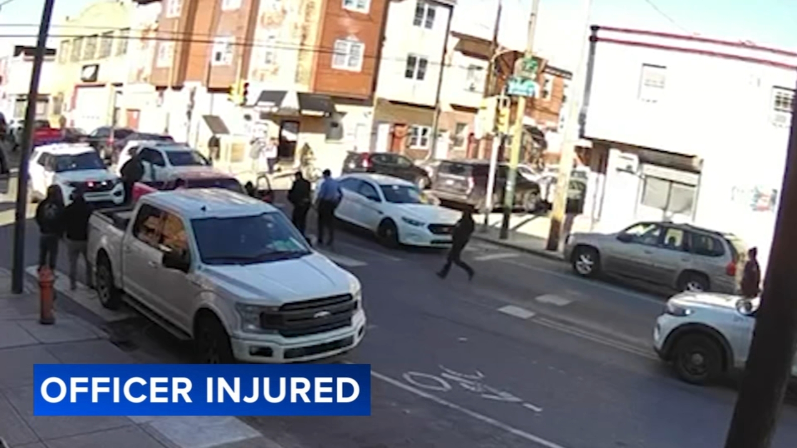 Philadelphia police officer injured pursuing fleeing suspect driving on ...