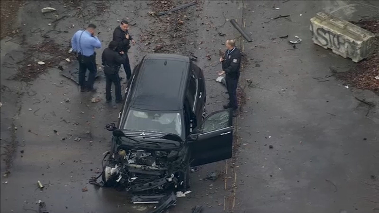 Driver killed after SUV crashes through concrete barrier in the ...
