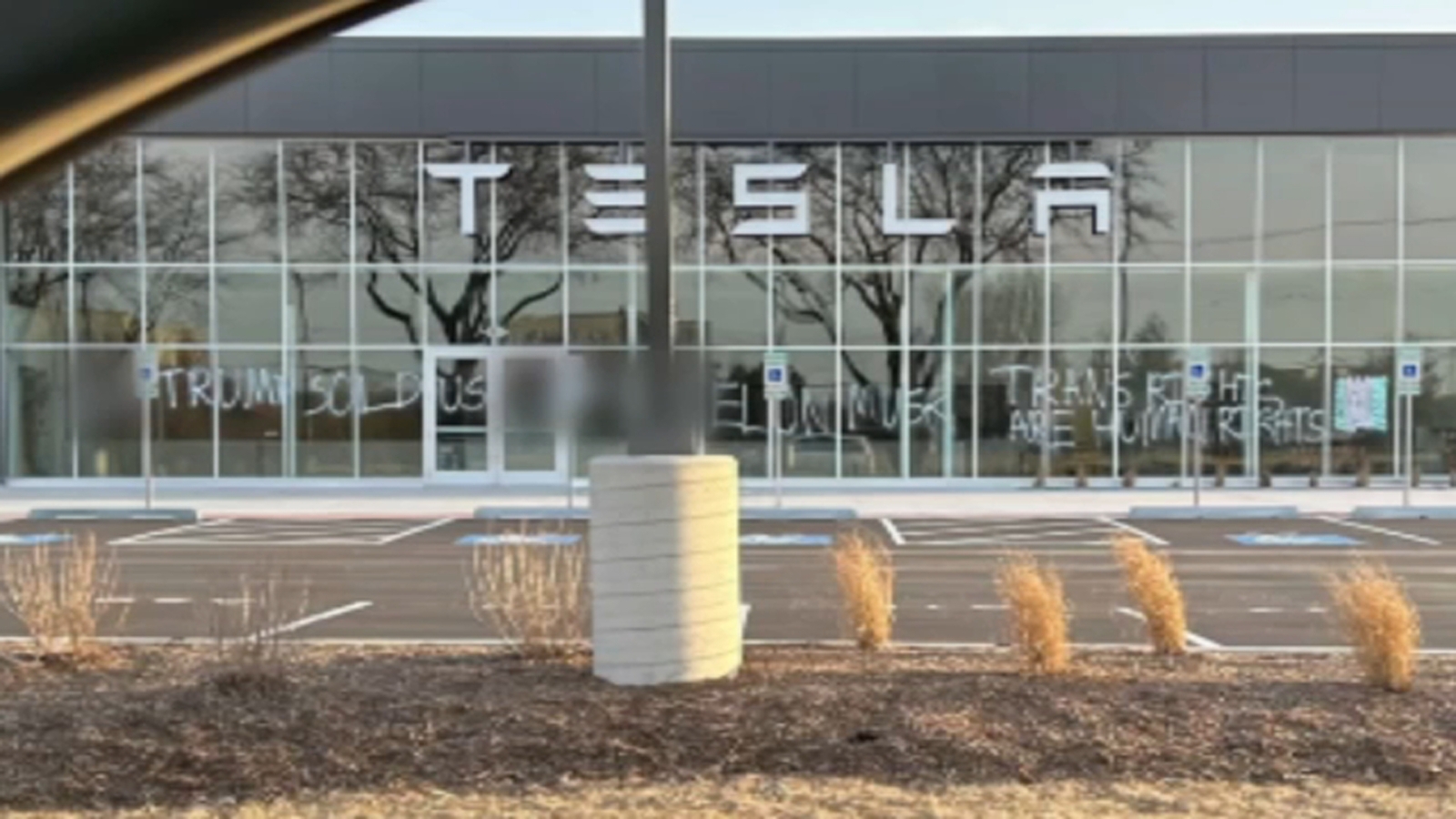 Tesla car dealership vandalized in Buffalo Grove with graffiti critical ...
