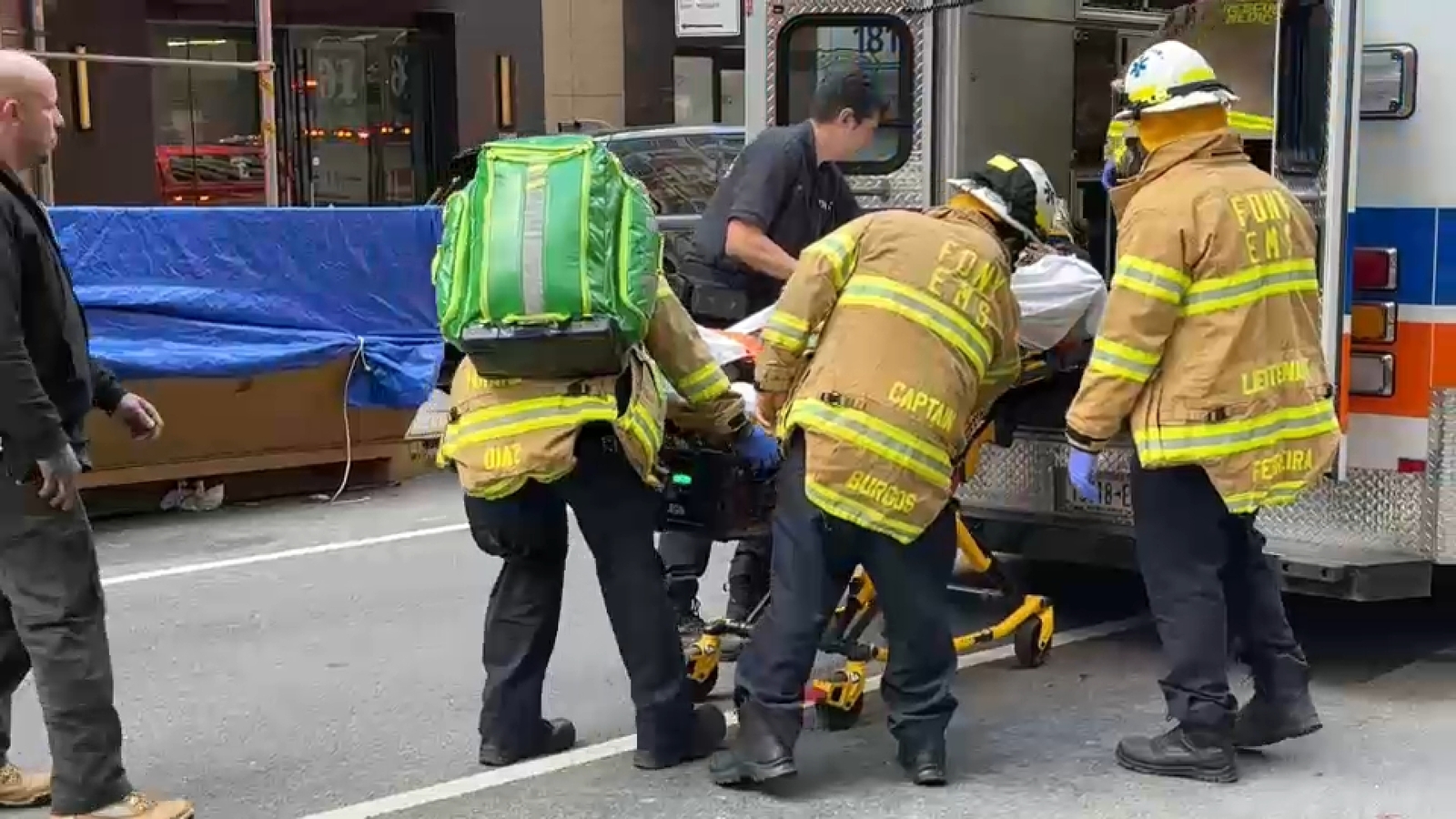 FDNY rescues worker after dumbwaiter falls on him inside Midtown ...