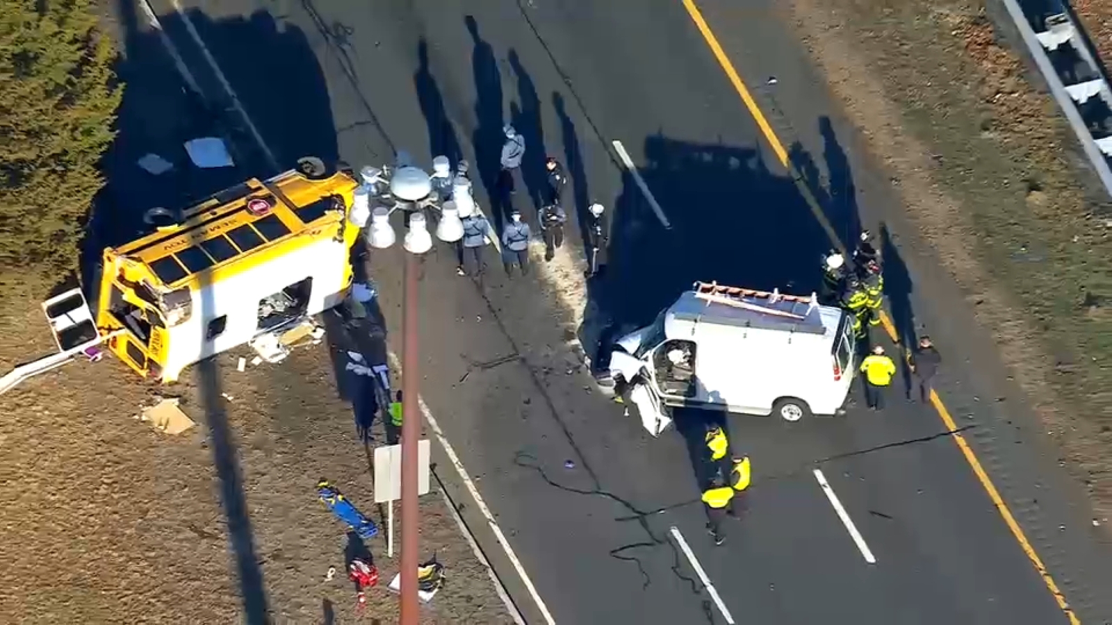 School bus crash: driver, 4 students injured after school bus overturns ...