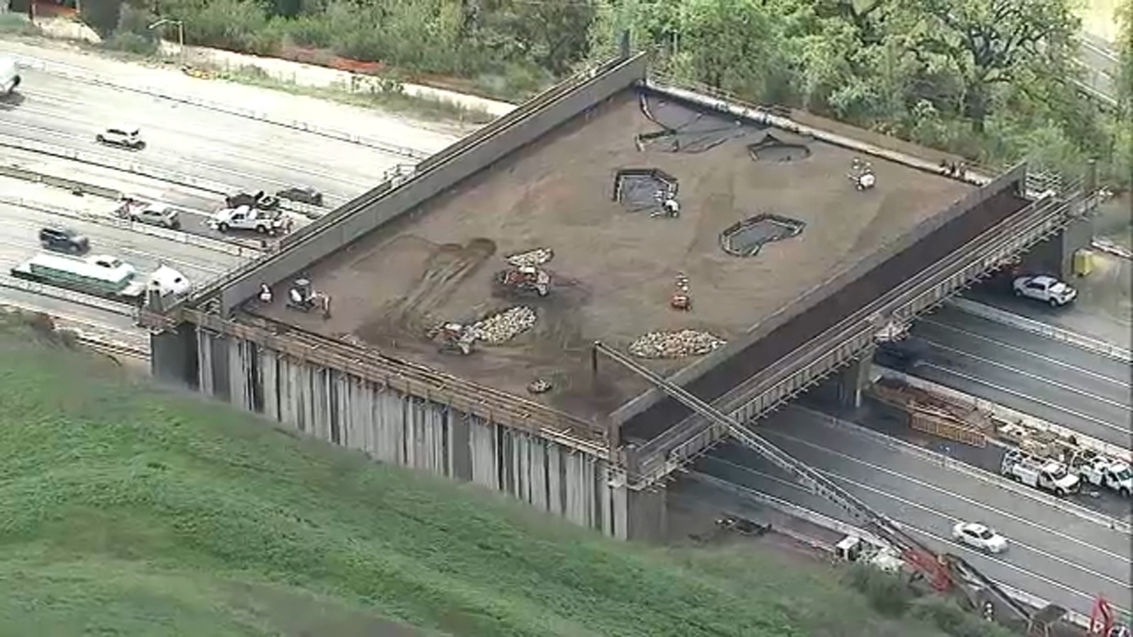 Crews lay first layers of soil for Wallis Annenberg Wildlife Crossing ...