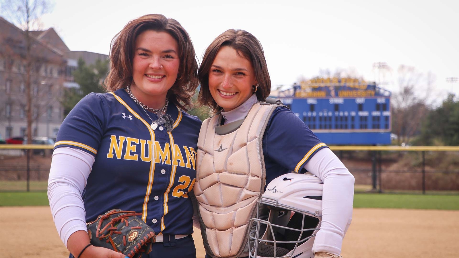 Sisters star as pitcher-catcher-duo on softball field at Neumann ...