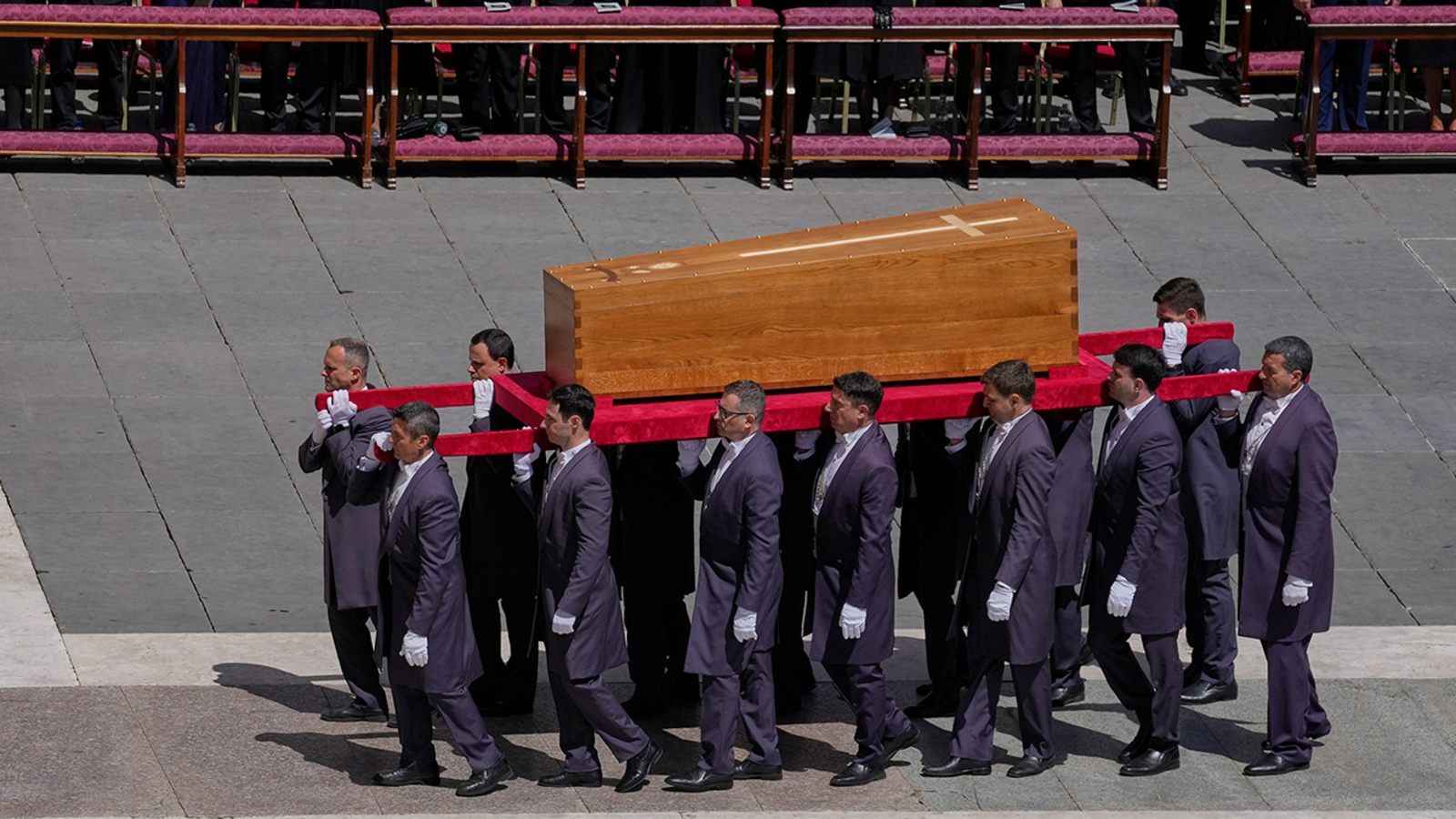 Crowds applaud as pope's casket carried out of St. Peter's Square ...