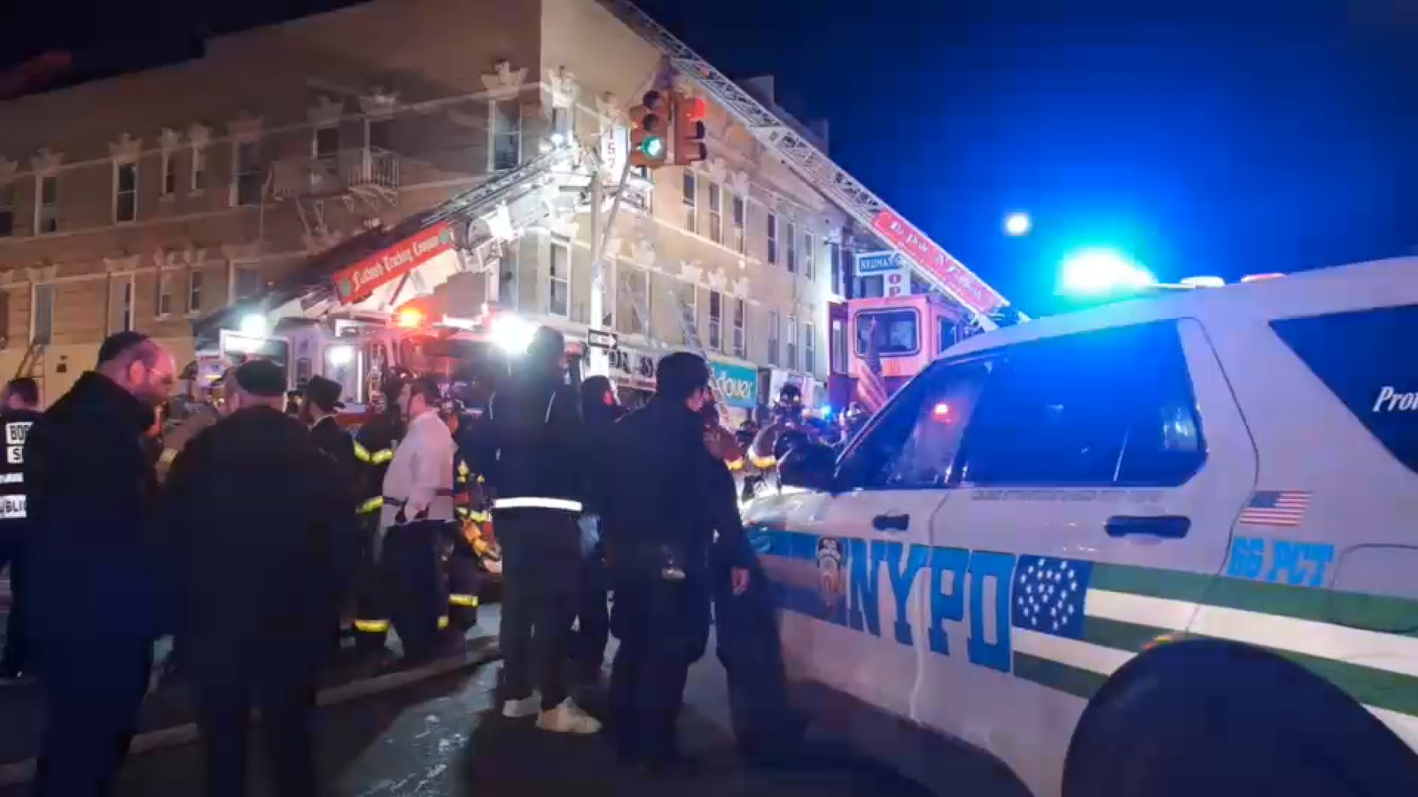 Fire burns through store, residents evacuate apartments above in ...