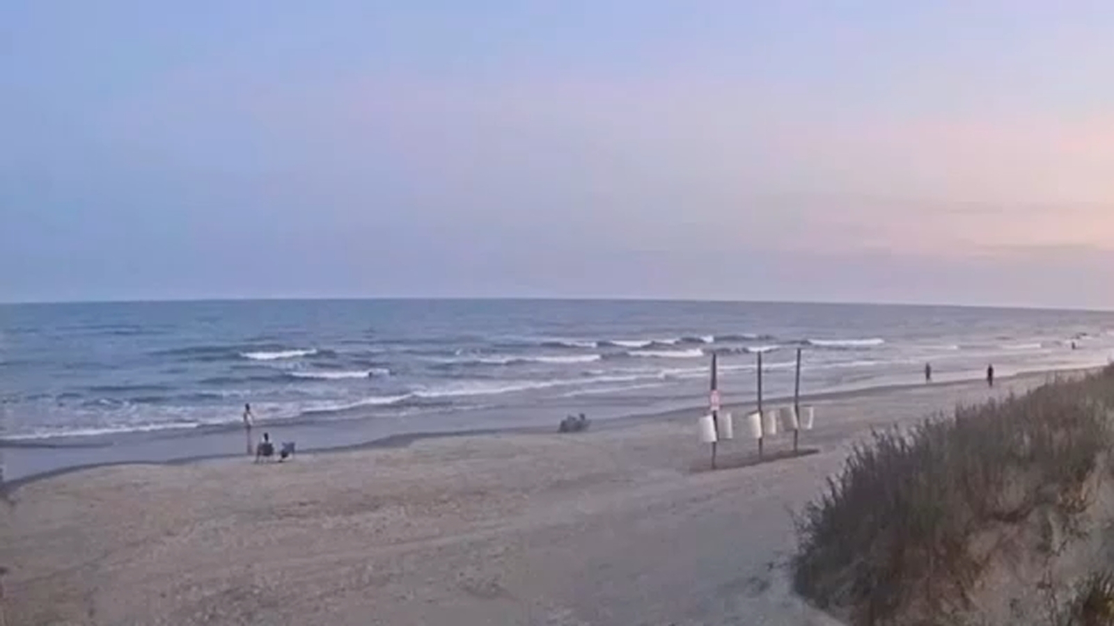Swimmer injured in possible shark attack off Sunset Beach in North ...