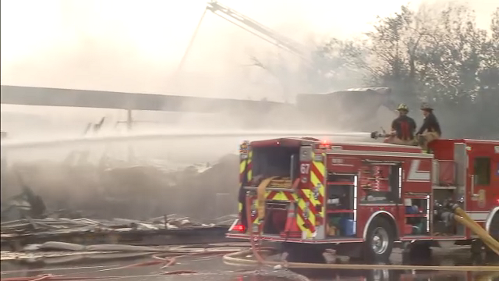 Firefighter hospitalized after battling commercial building fire off N ...
