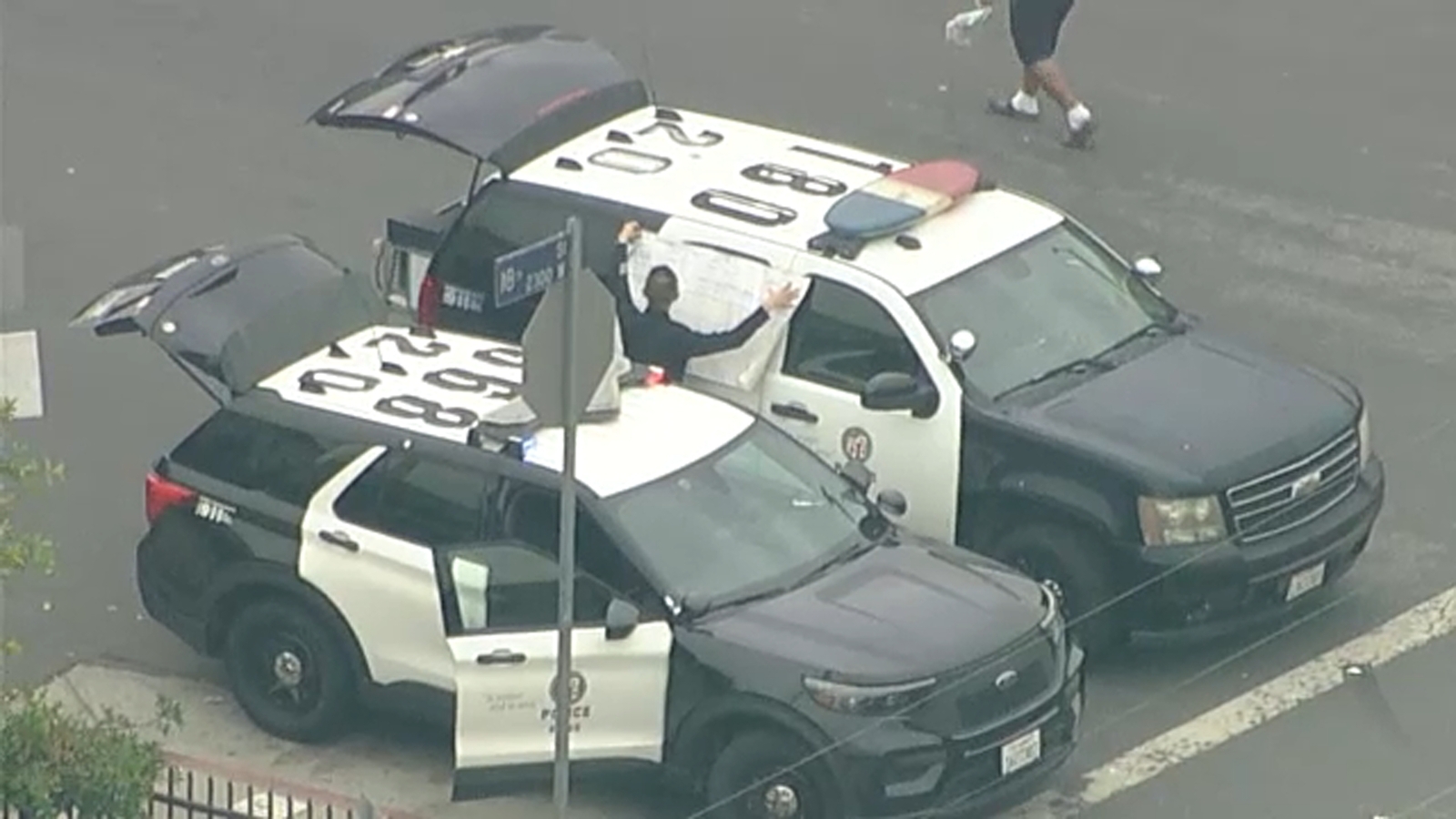 Man shot, wounded by police after allegedly pointing shotgun at LAPD ...