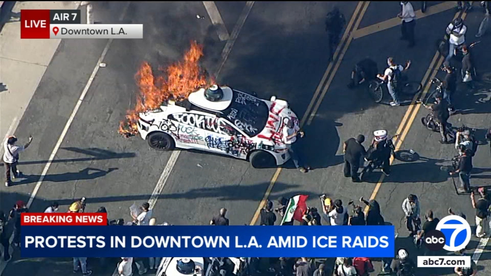 Anti-ICE protesters set Waymo vehicles on fire in downtown LA - ABC7 ...