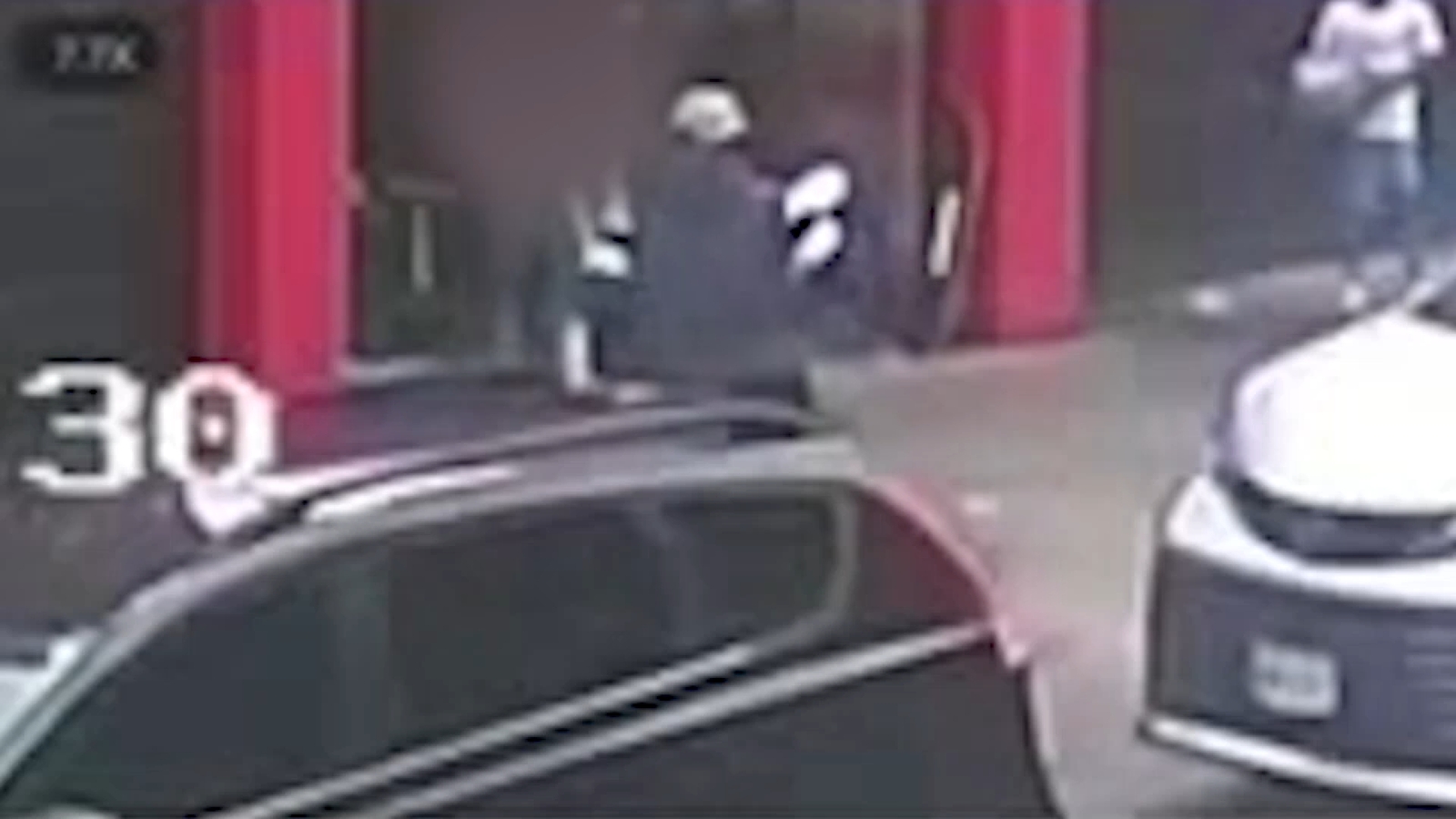 Surveillance video shows suspect on moped allegedly yank chain from 5 ...