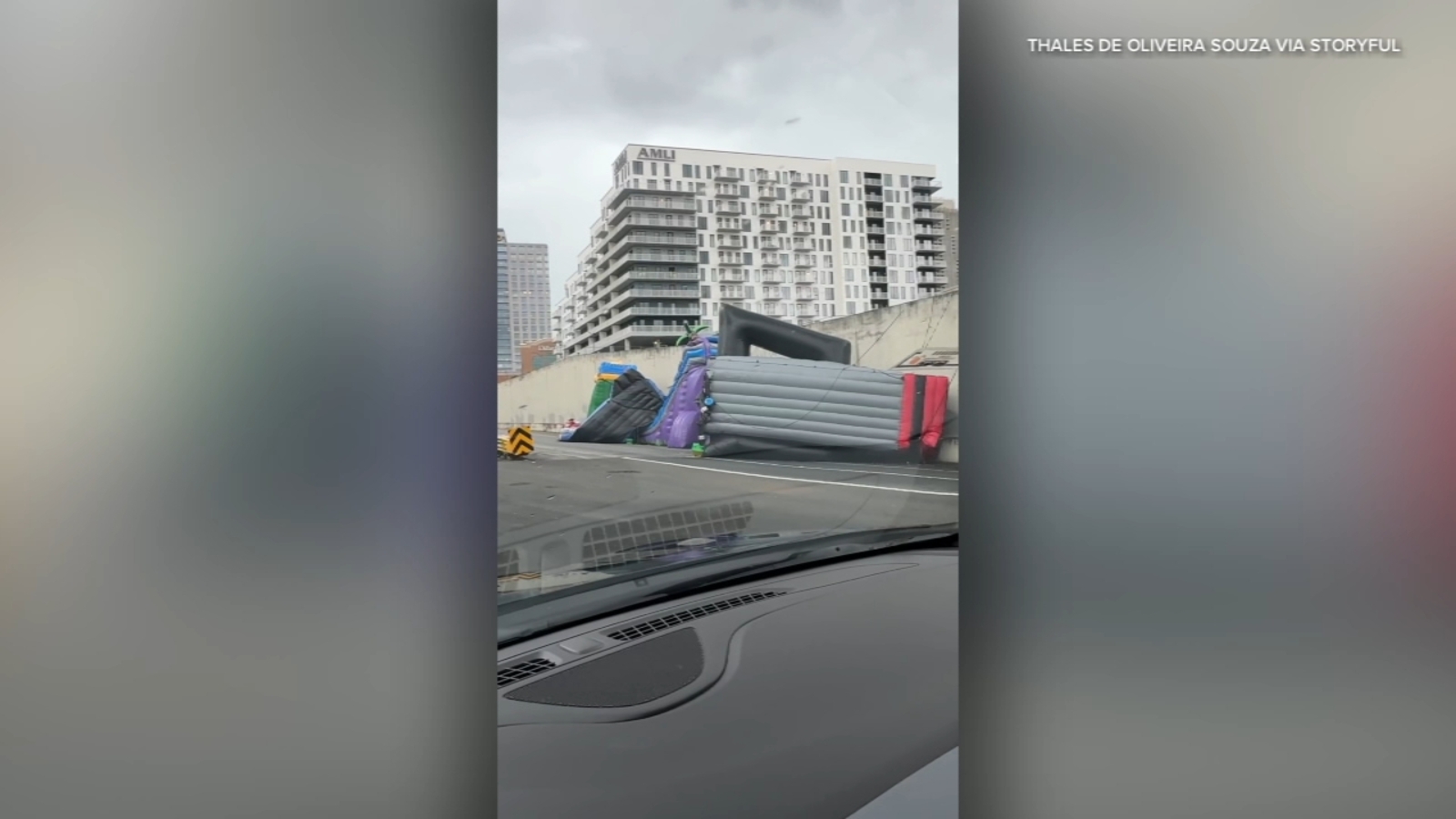 Inflatable water slides from Slide City Waterpark fly onto busy road ...