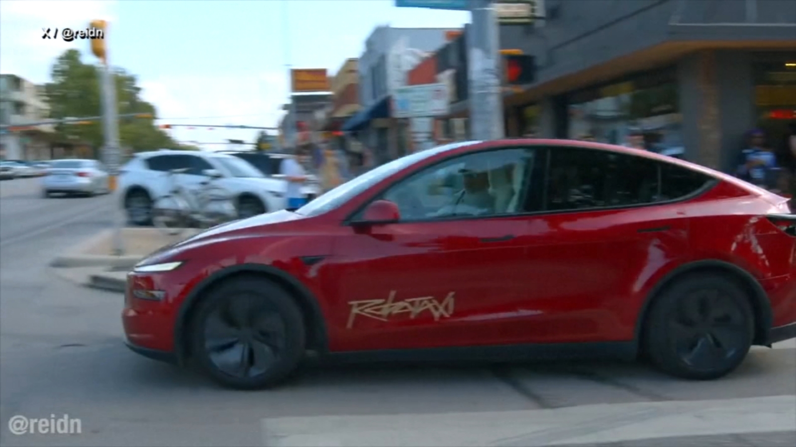 Tesla launches Robotaxi service in Bay Area with drivers, as questions ...