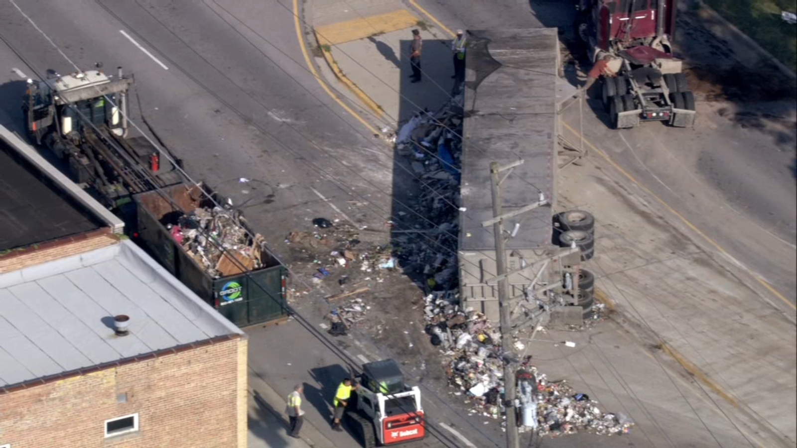 Semi-truck rollover crash spills garbage on Golf Road in Des Plaines ...