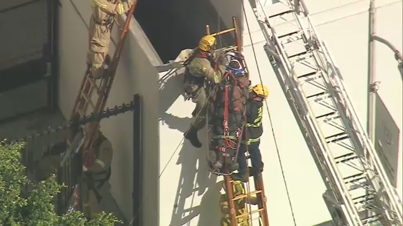 Firefighters rescue man trapped in shaft for hours after 40-foot fall ...