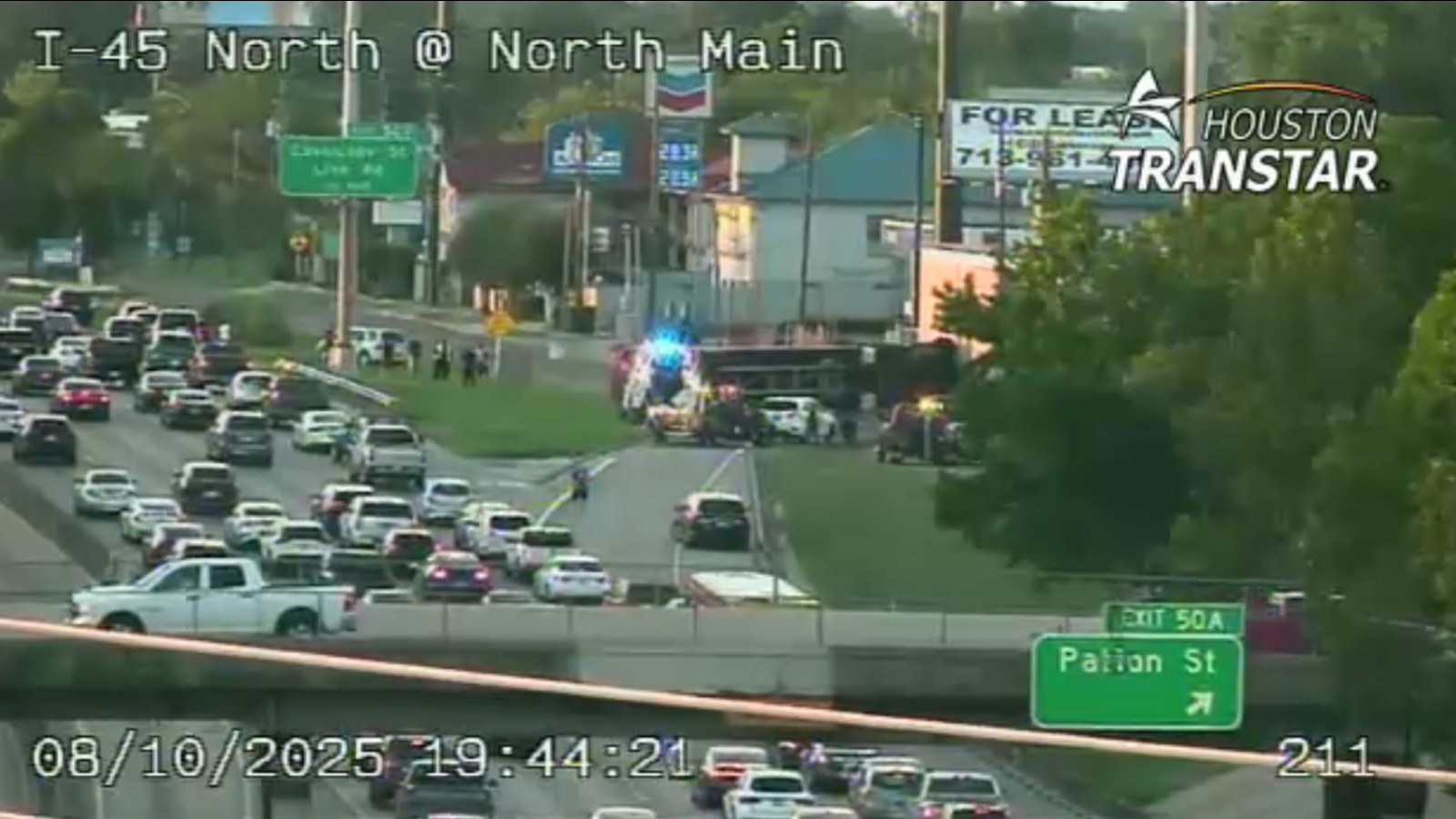 North Freeway frontage lanes closed after 18-wheeler overturns near ...