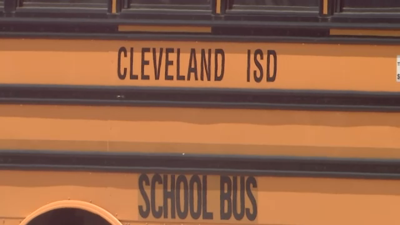 Cleveland ISD school bus with students onboard lands on its side after ...
