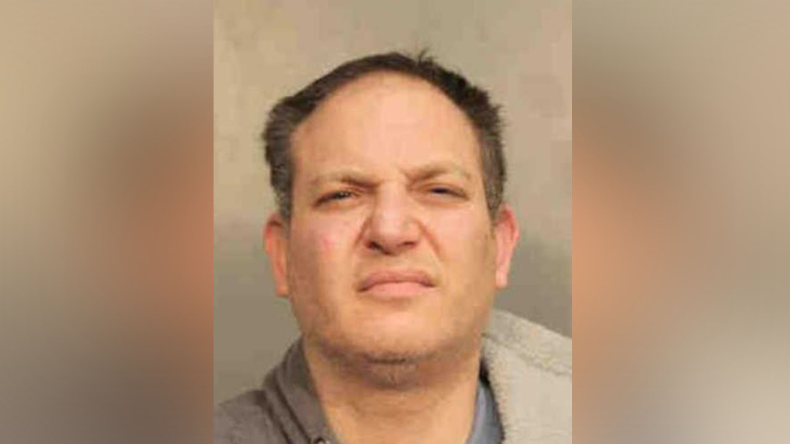 Police arrest man they said tried to take officer's gun while being ...