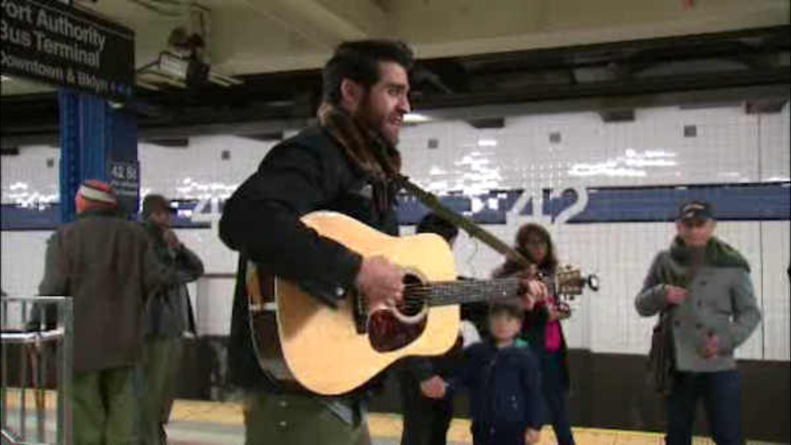 Subway singer encourages homeless to take money from his donation case ...