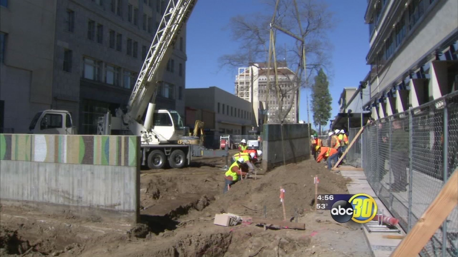 Crews work to move art to open up street traffic on the Fulton Mall ...