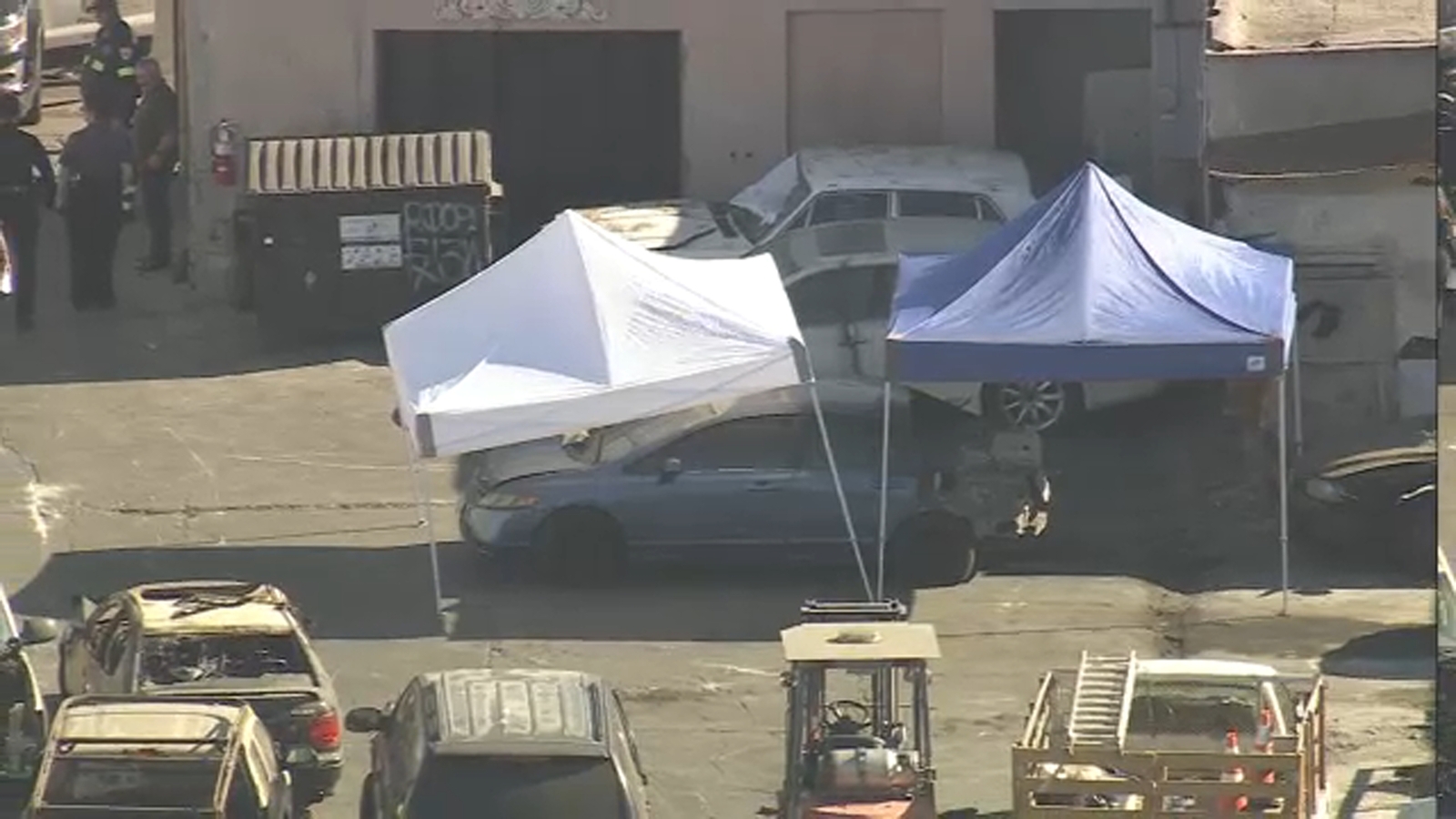 Police investigating body found in car at Al's Towing in South Los ...