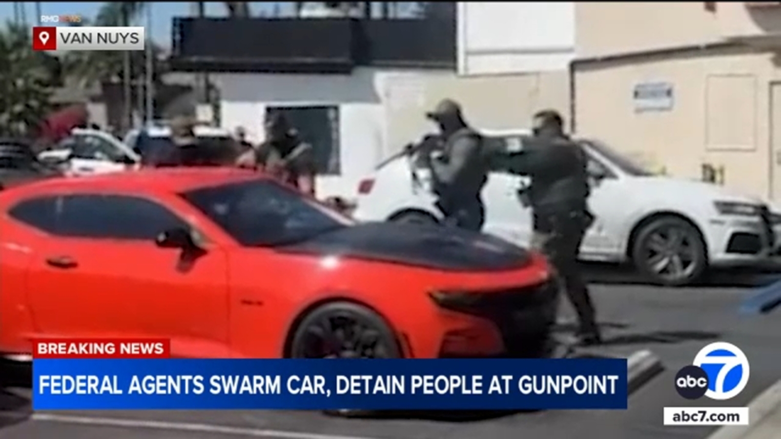Federal agents detain multiple people at gunpoint in Van Nuys, video ...