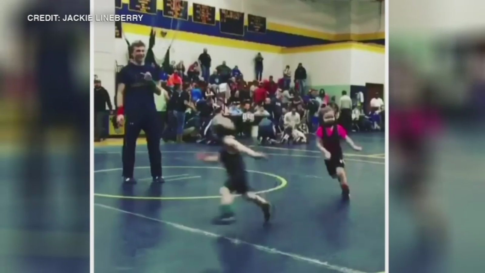 Young wrestler runs away from competitor on the mat - ABC7 Chicago