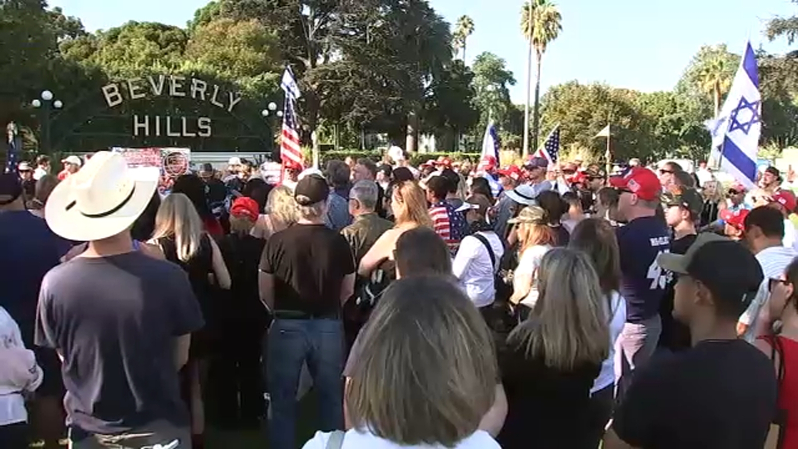 Hundreds gather for vigil and rally for slain political activist ...