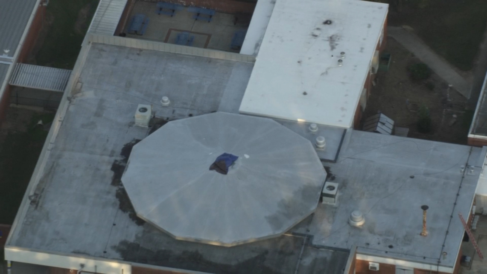 NC teenage boy injured after falling through skylight on roof of ...