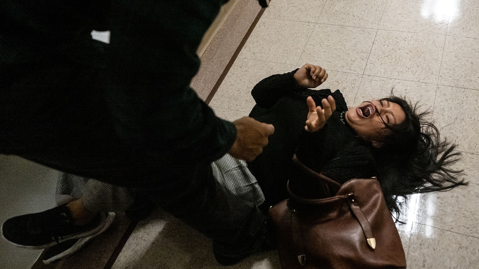 ICE officer seen pushing woman to the floor at NYC immigration ...