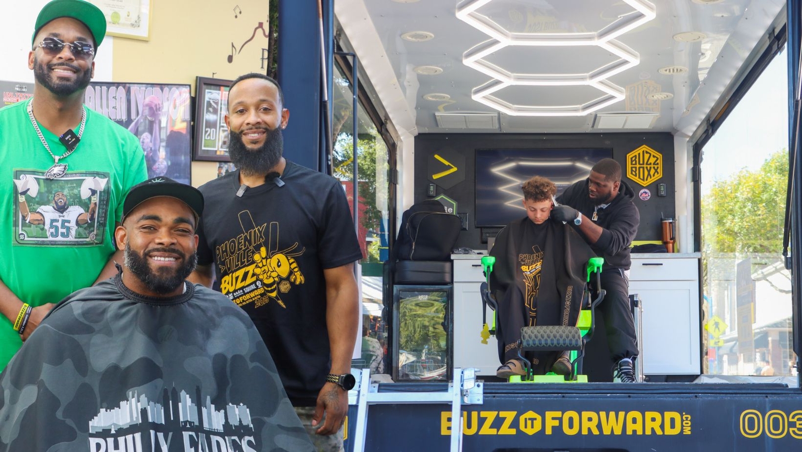 Brandon Graham helps local barber shop 'Buzz it Forward' for kids in ...