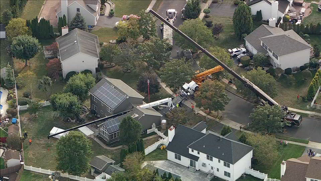 Crane Crashes 1 Injured After Large Crane Collapses, Falls Onto