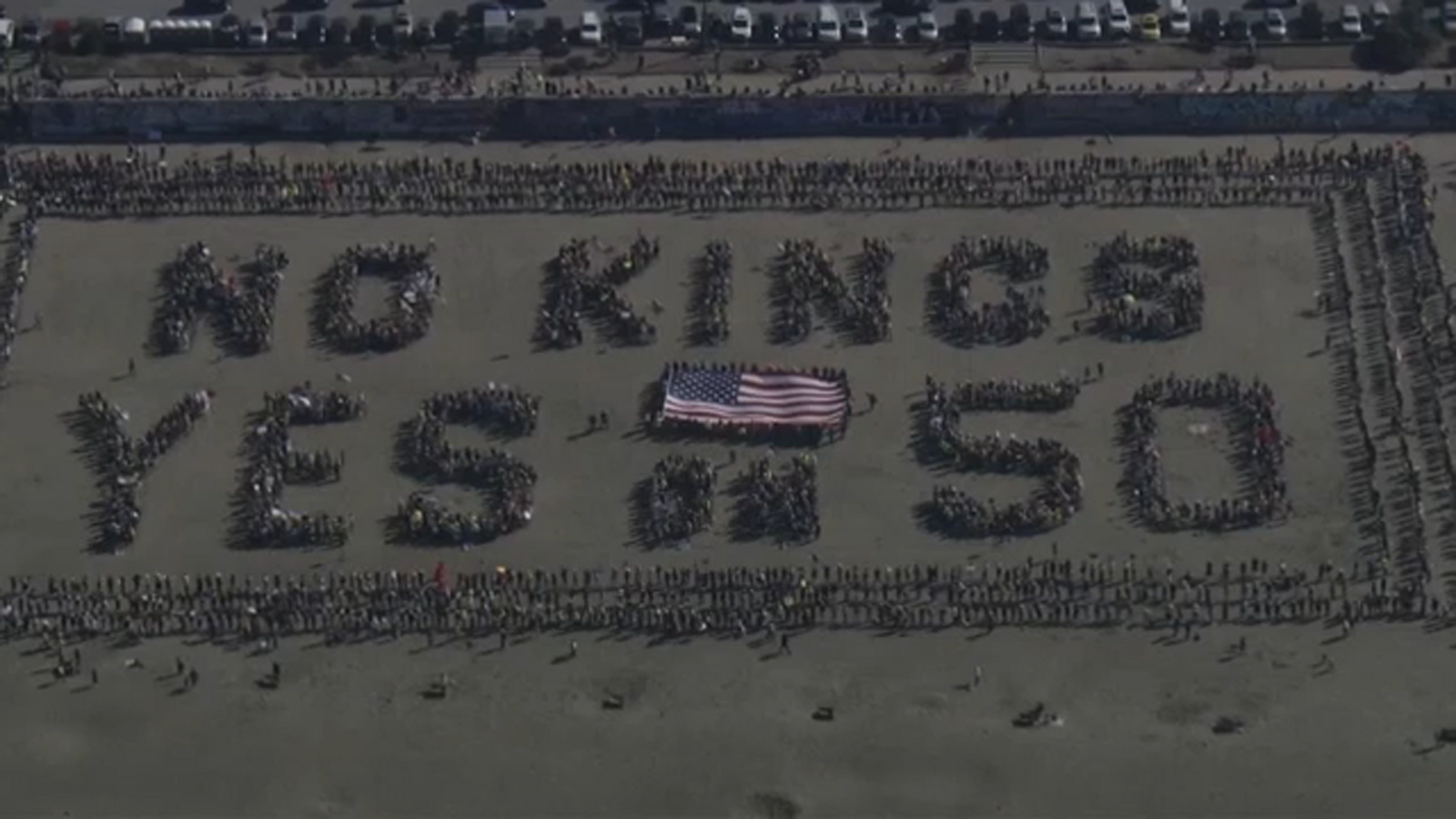 No Kings protesters create human banner at SF's Ocean Beach - ABC7 San ...
