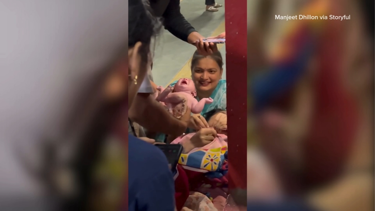 Video shows man delivers baby on train platform with doctor on video ...
