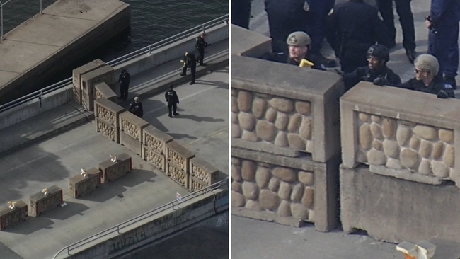 Law enforcement set up barricades for protesters on Coast Guard Island ...