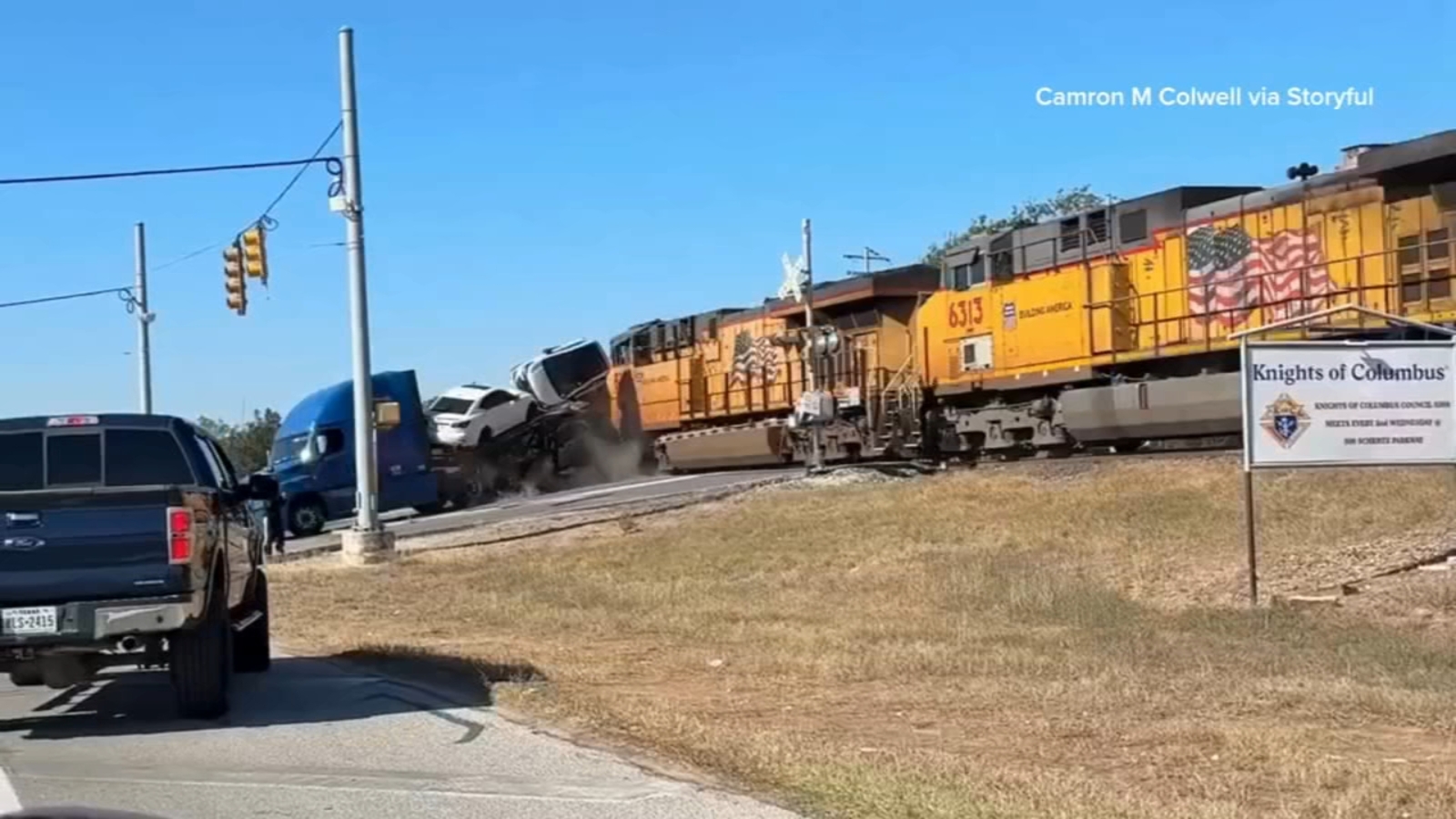 Terrifying video shows moment train smashes into 18-wheeler hauling ...