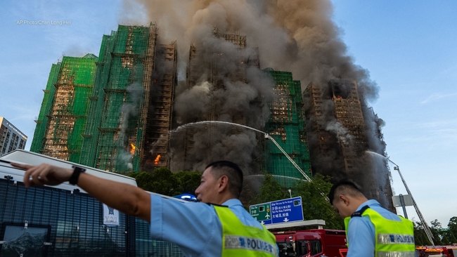 Death toll rises as massive fire engulfs Hong Kong high-rise apartment ...