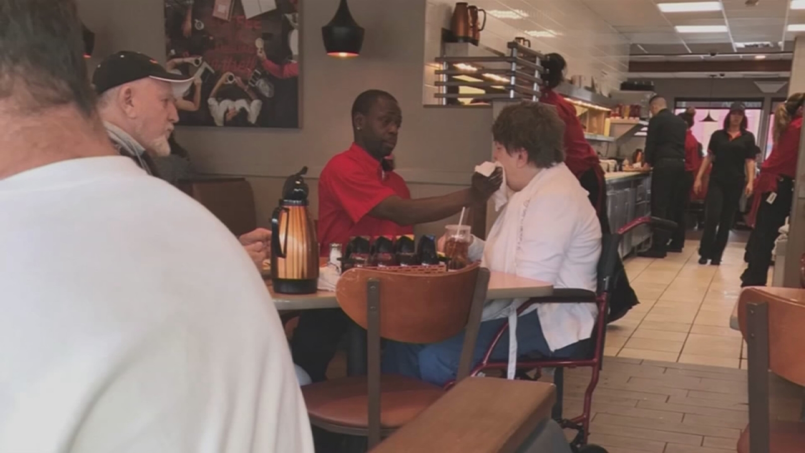 Photo of Springfield, Illinois IHOP server helping woman eat goes viral ...